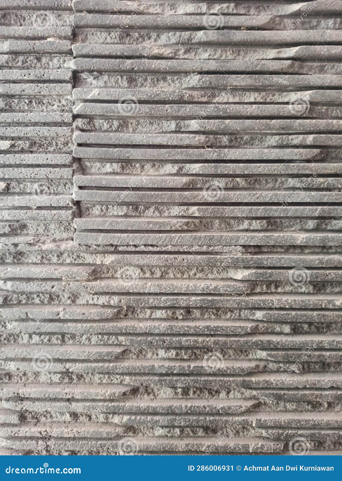 A Wall with a Rough, Striped Stone Surface. Stock Image - Image of ...