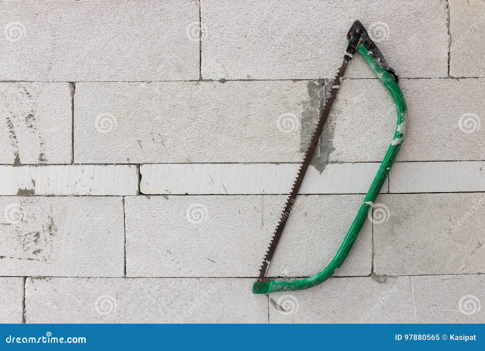 Wall with saw hanging stock image. Image of blocks, isolated - 97880565