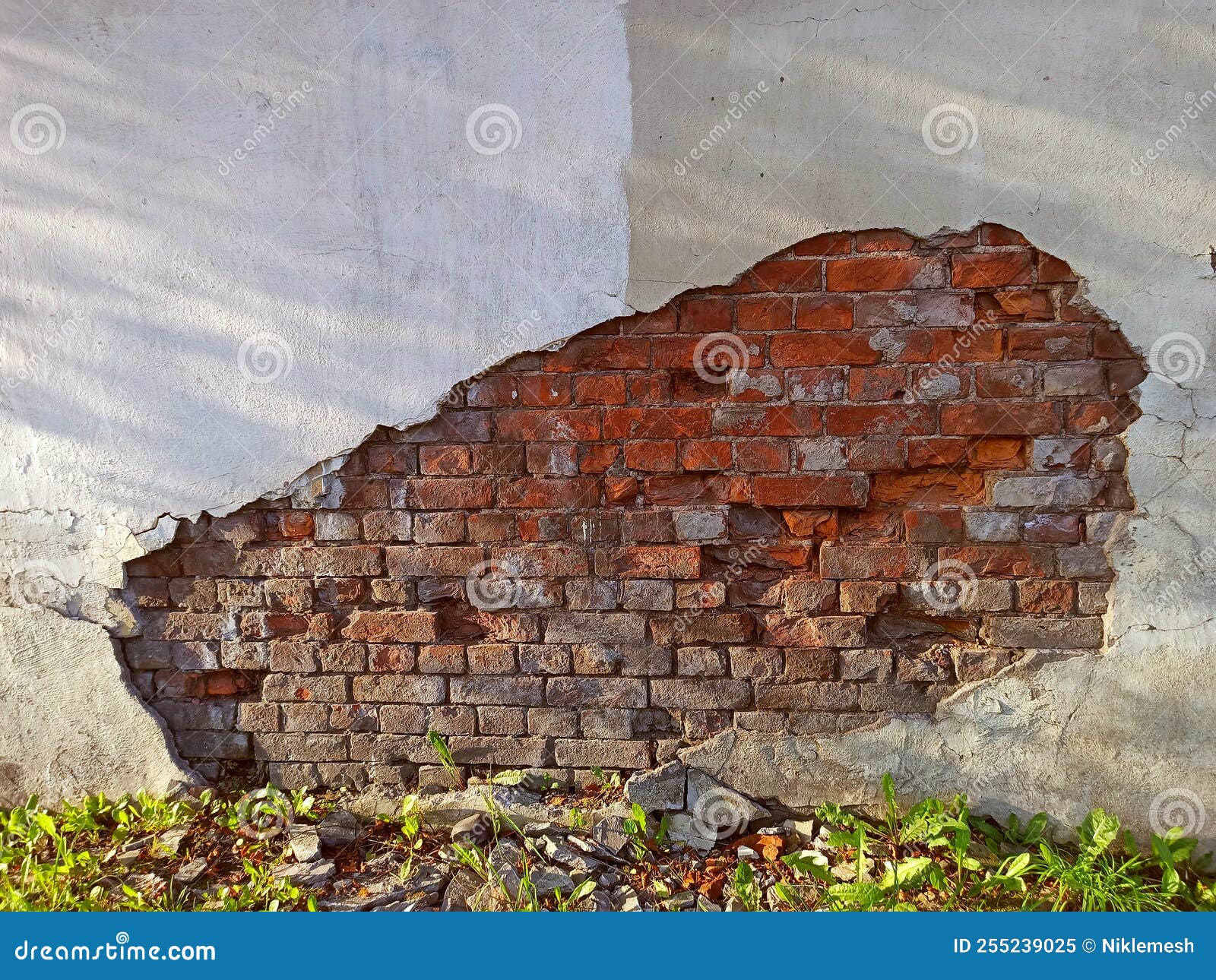 On the Outer Wall, in the Slanting Sunlight, Behind a Large Fragment of ...