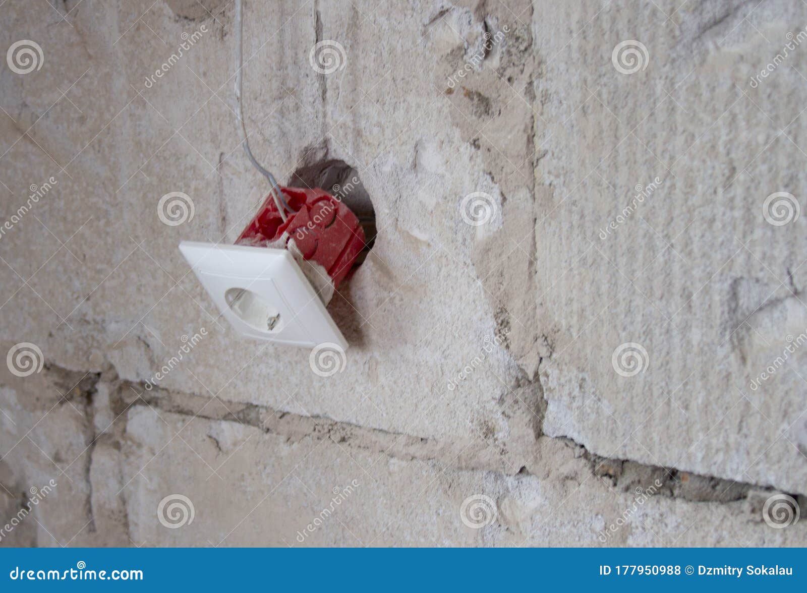 Socket Installation. A Master Electrician Installs An Electrical ...