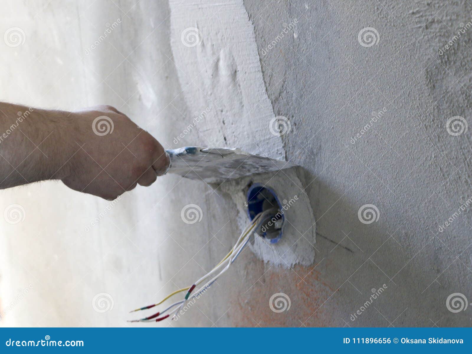 Wall Socket Installation.Work on Installing Electrical Outlets ...