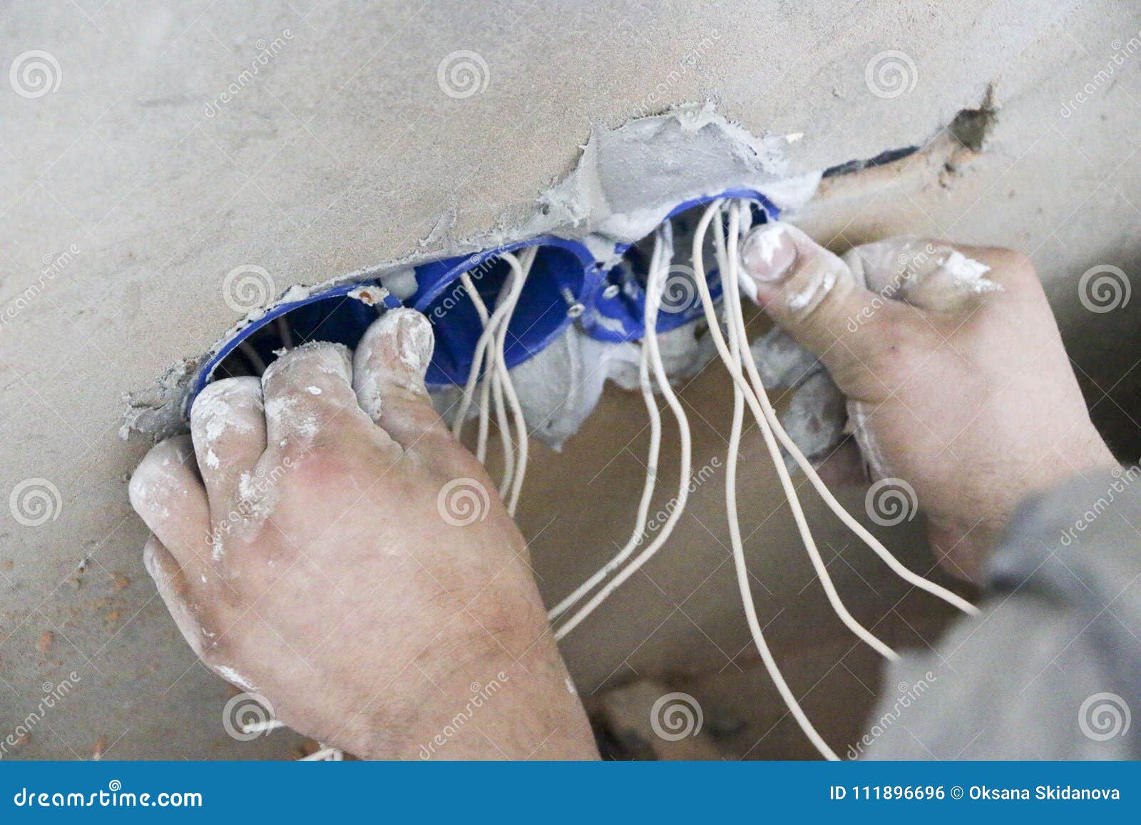 Wall Socket Installation.Work on Installing Electrical Outlets ...