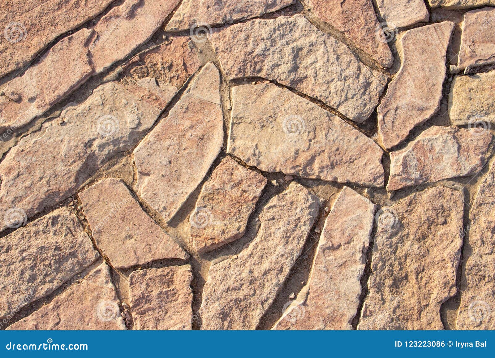 Wall of Light Round Smooth Stones Stock Photo - Image of house, foot ...