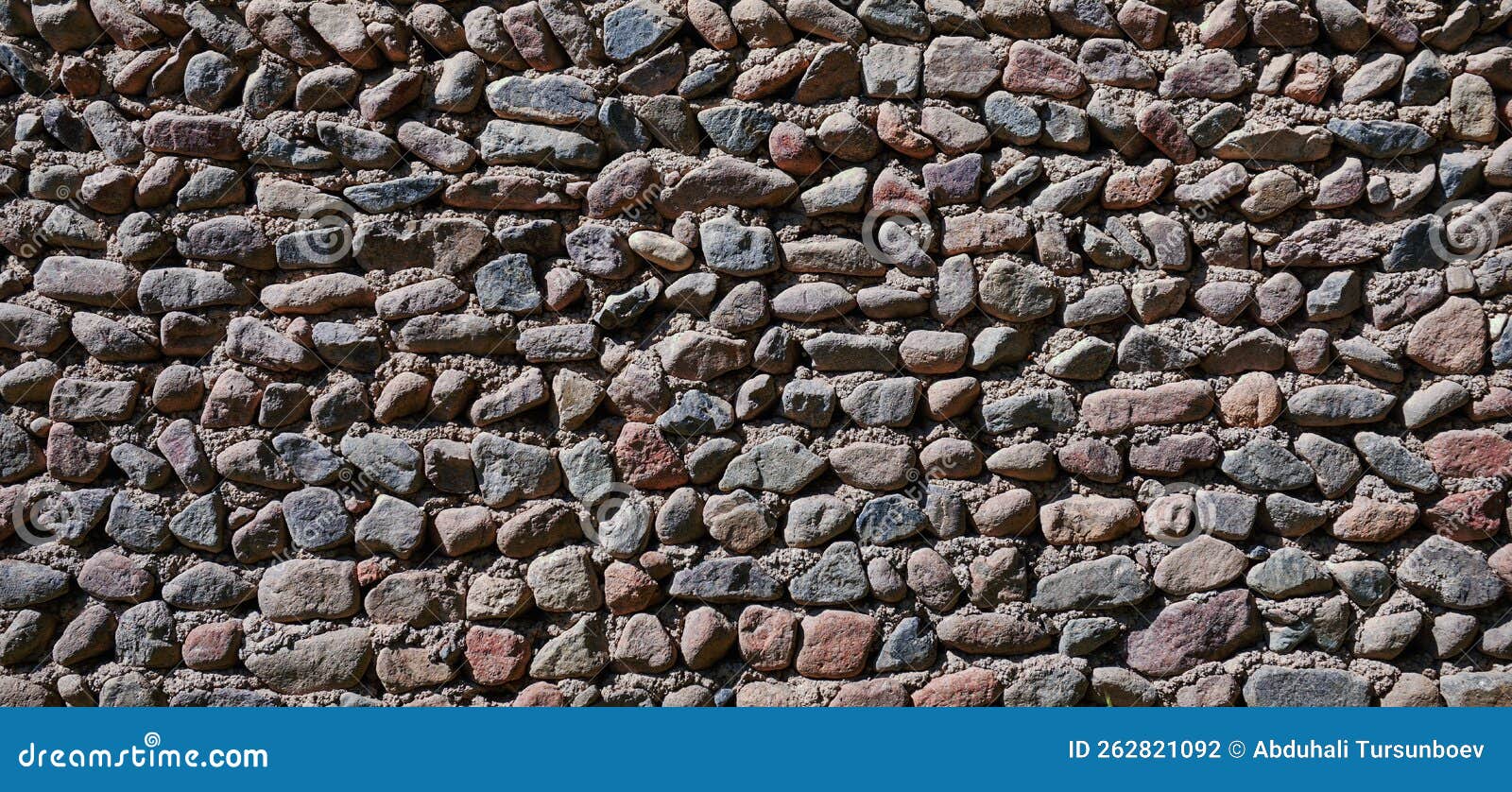 A Wall Structure Made of Round Stones Stock Photo - Image of nature ...