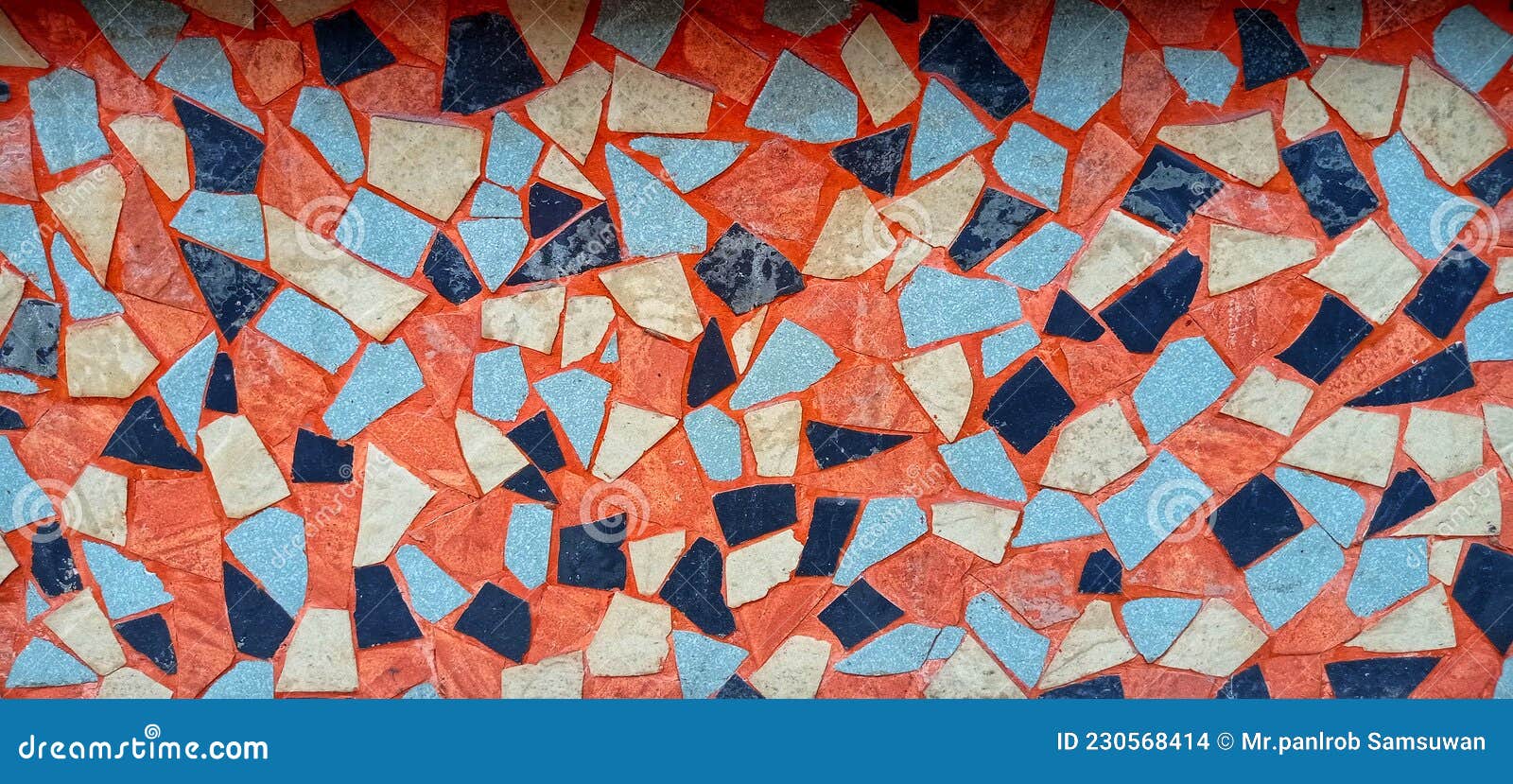 The Wall Surface is a Broken Tile Pattern in Many Colours. Stock Photo ...