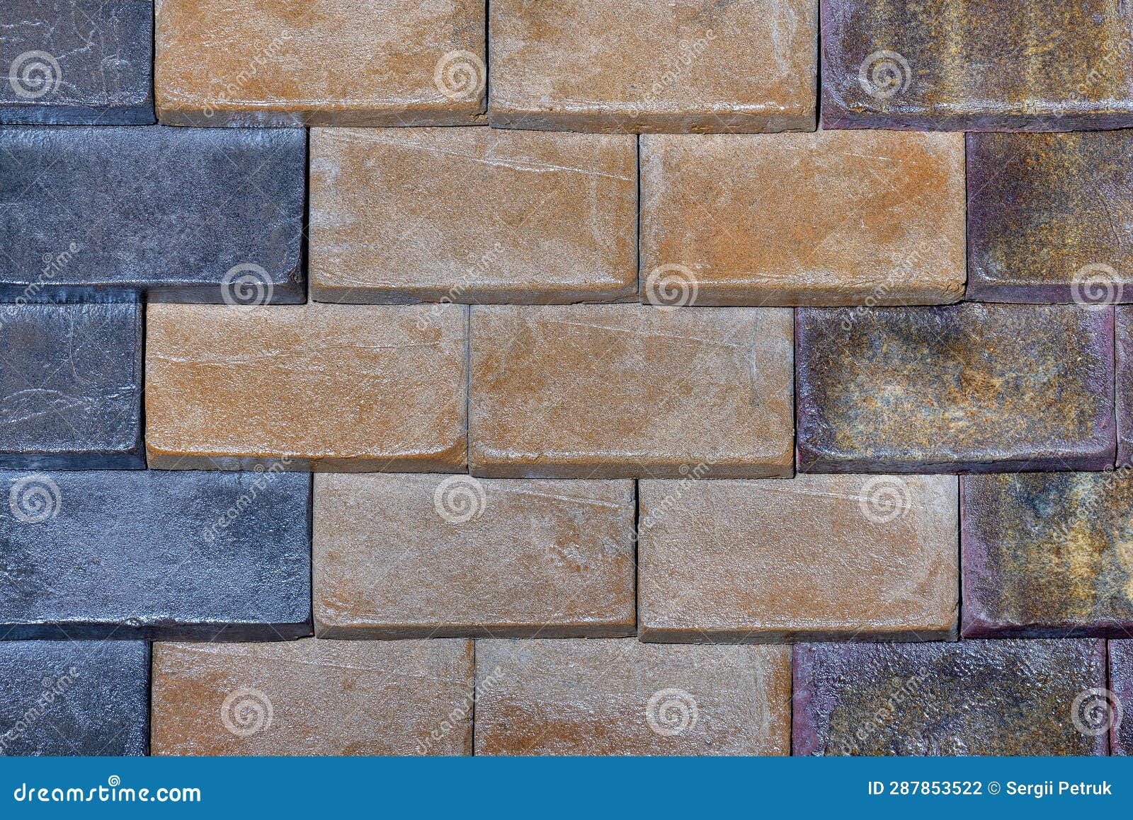 The Stone Wall is Lined with Decorative Rectangular Blocks with ...