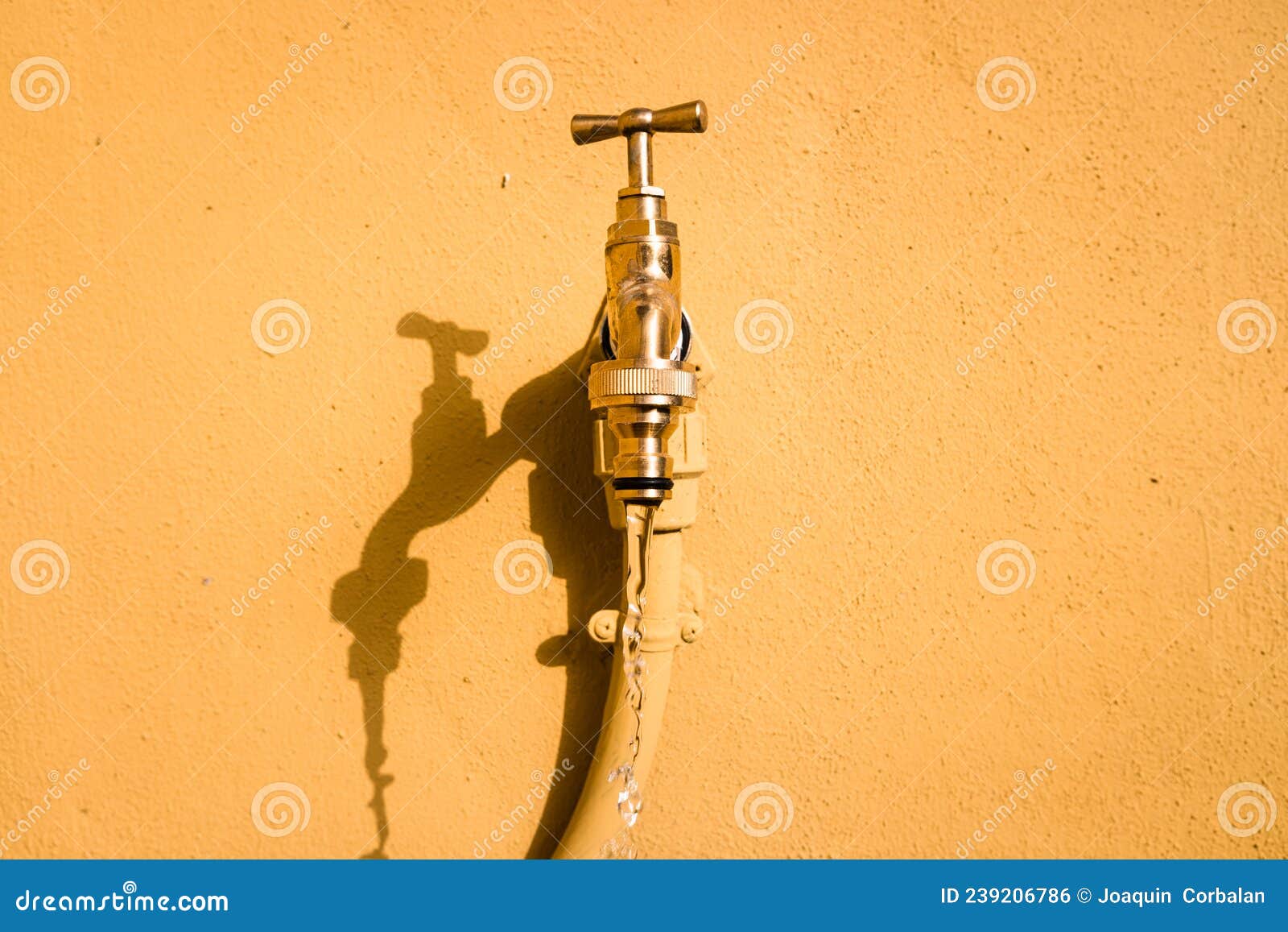 A Wall Tap on a Wall in the Sun from Which Fresh Water Drips Stock ...