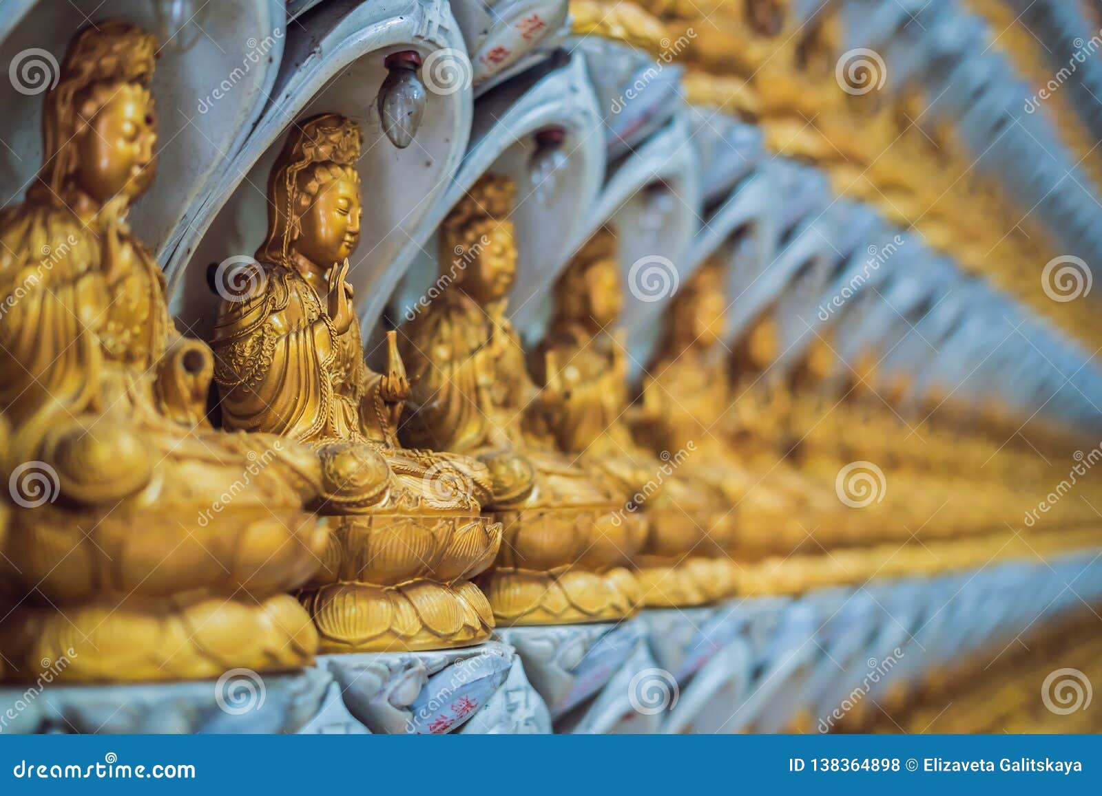 The Wall in the Temple is Filled with Buddhas. Religion Buddhism ...