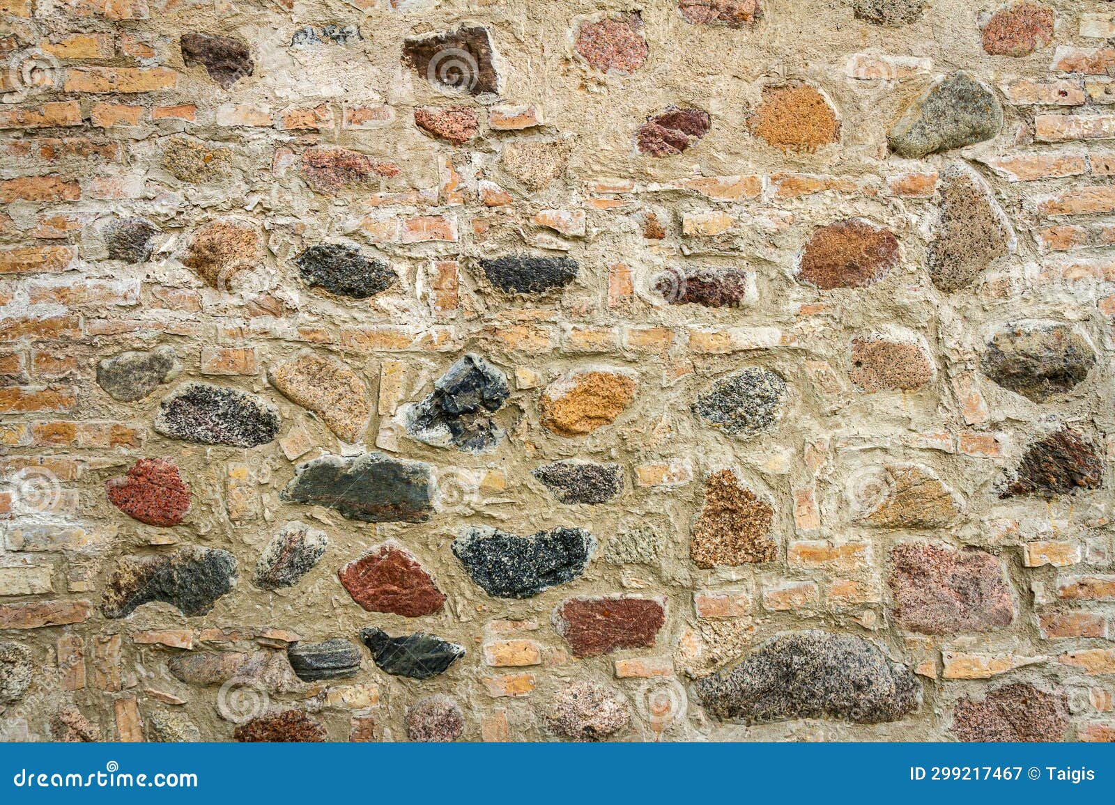 Wall Texture with Pieces of Old Bricks Mixed with Exposed Round Stones ...