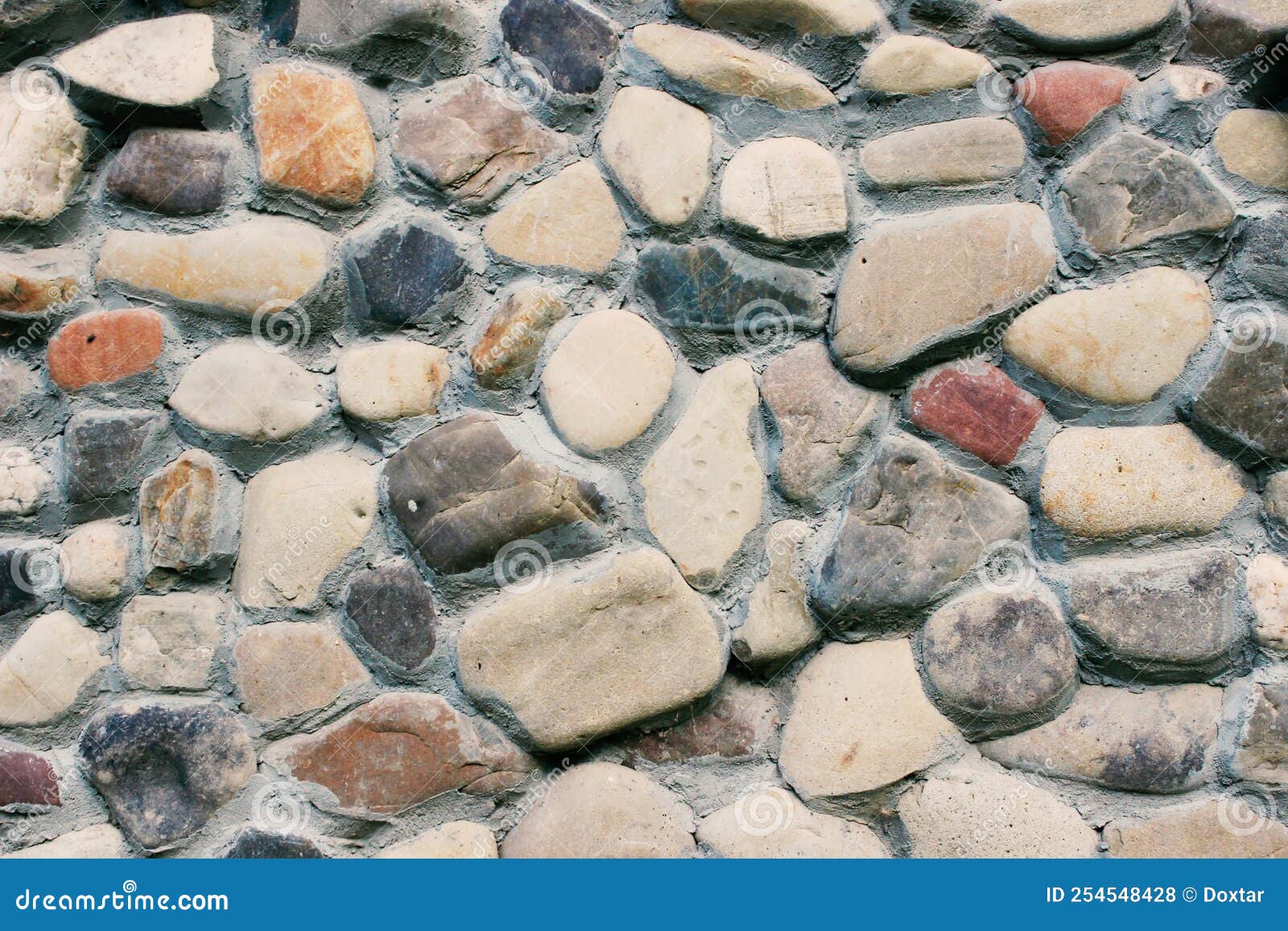 Wall Texture of Round Rocks Brick Background Stock Photo - Image of ...