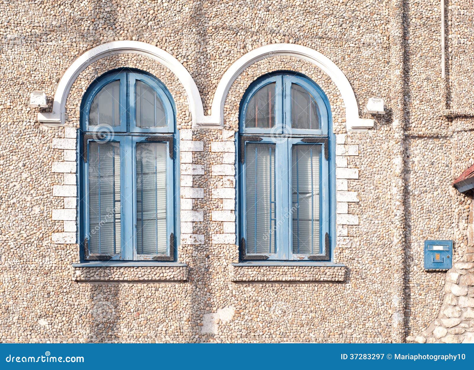 Wall with two blue windows stock image. Image of facade - 37283297