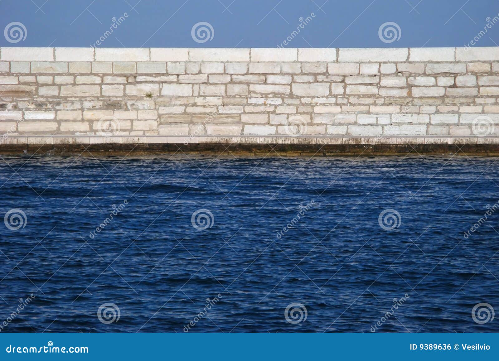 Wall and water stock photo. Image of border, lake, boundary - 9389636