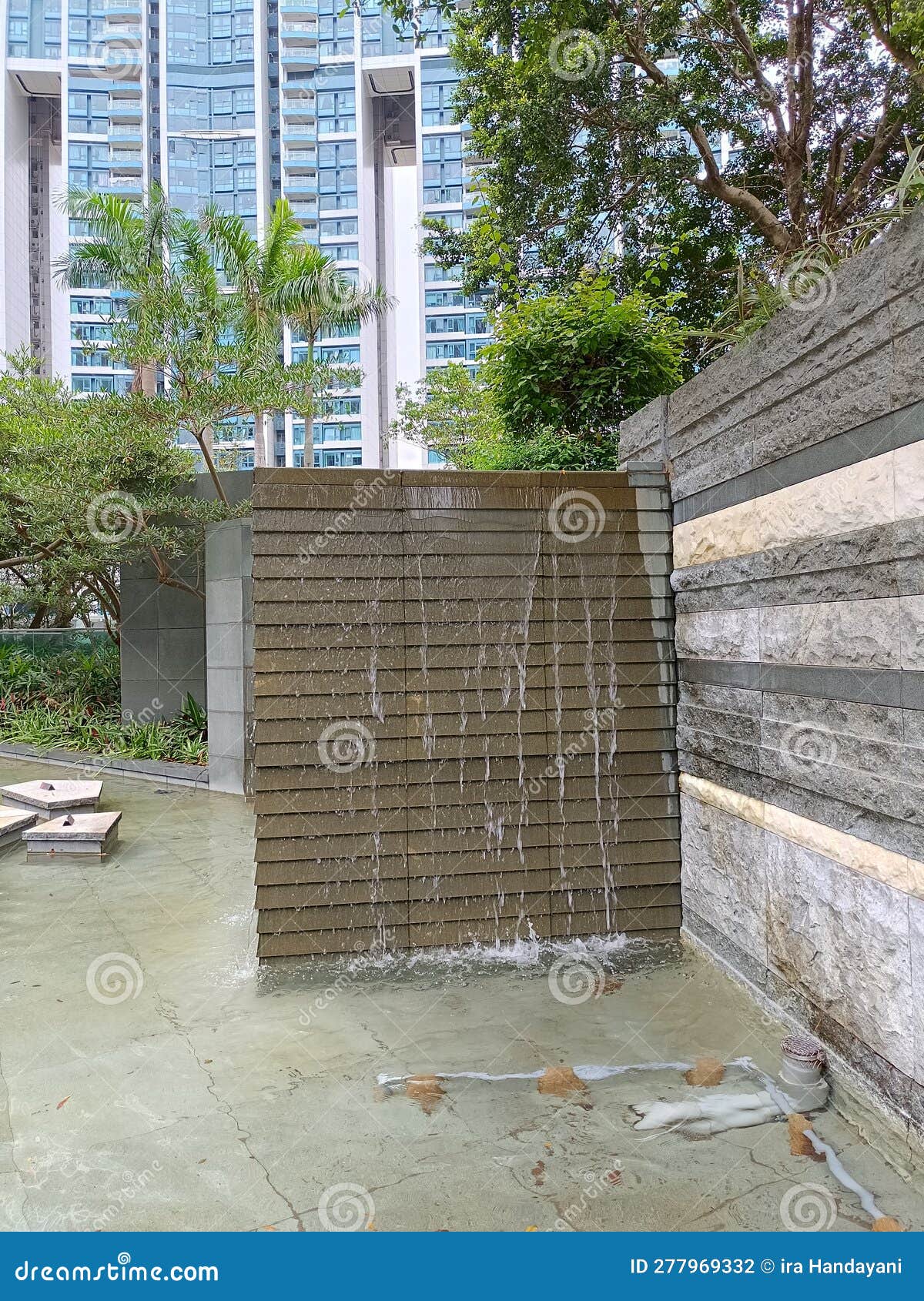 Wall of Waterfall Design in the City Stock Photo - Image of walkway ...