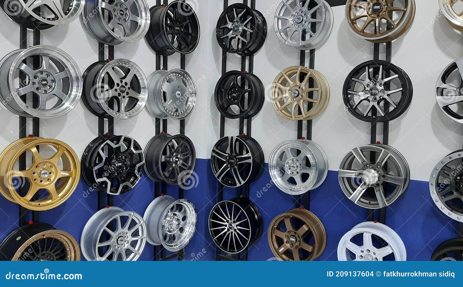 Wall of Wheels Car in the Garage Car Anthusiast Background Editorial ...