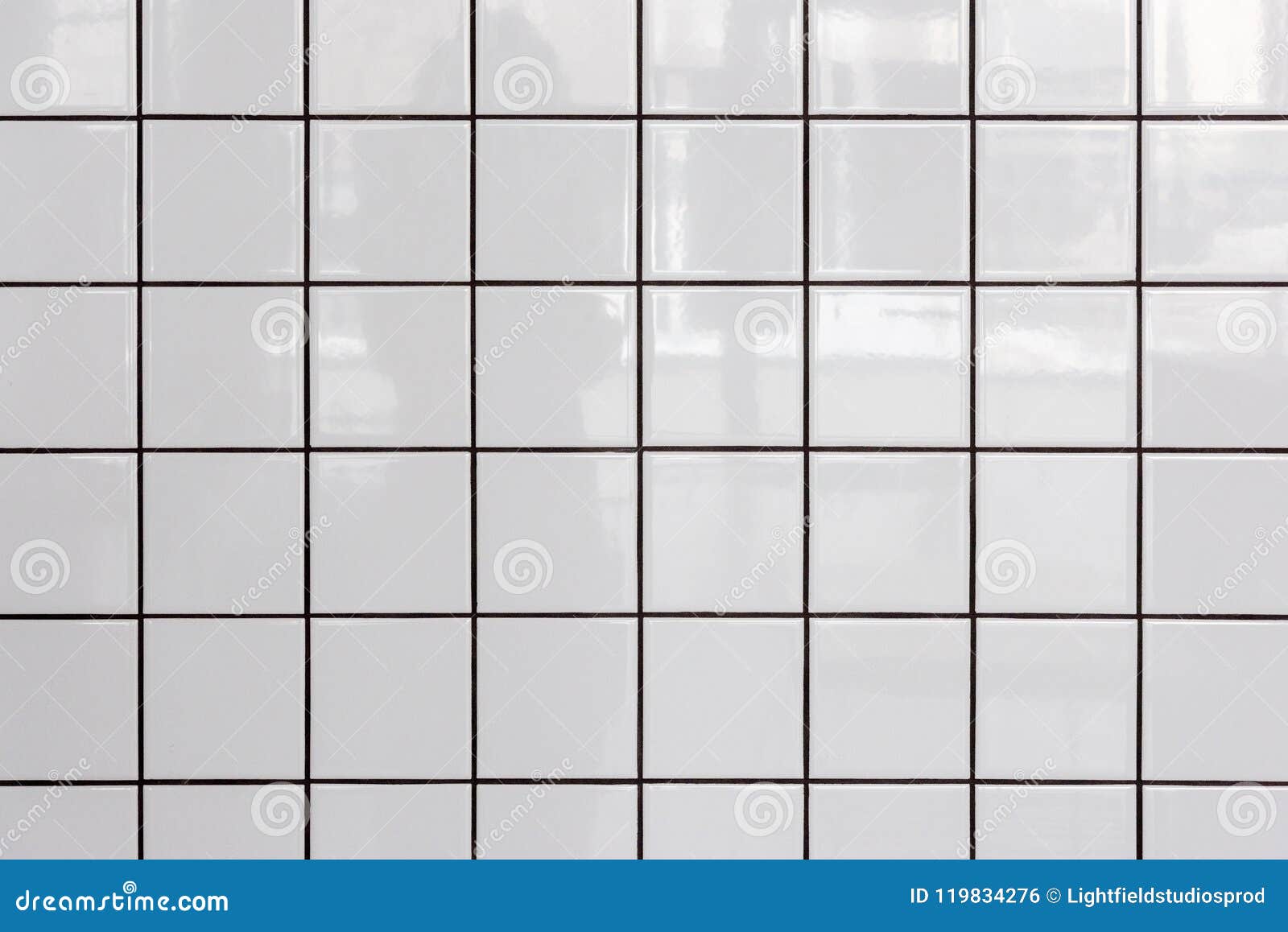 Wall of white glossy tiles stock photo. Image of wallpaper - 119834276