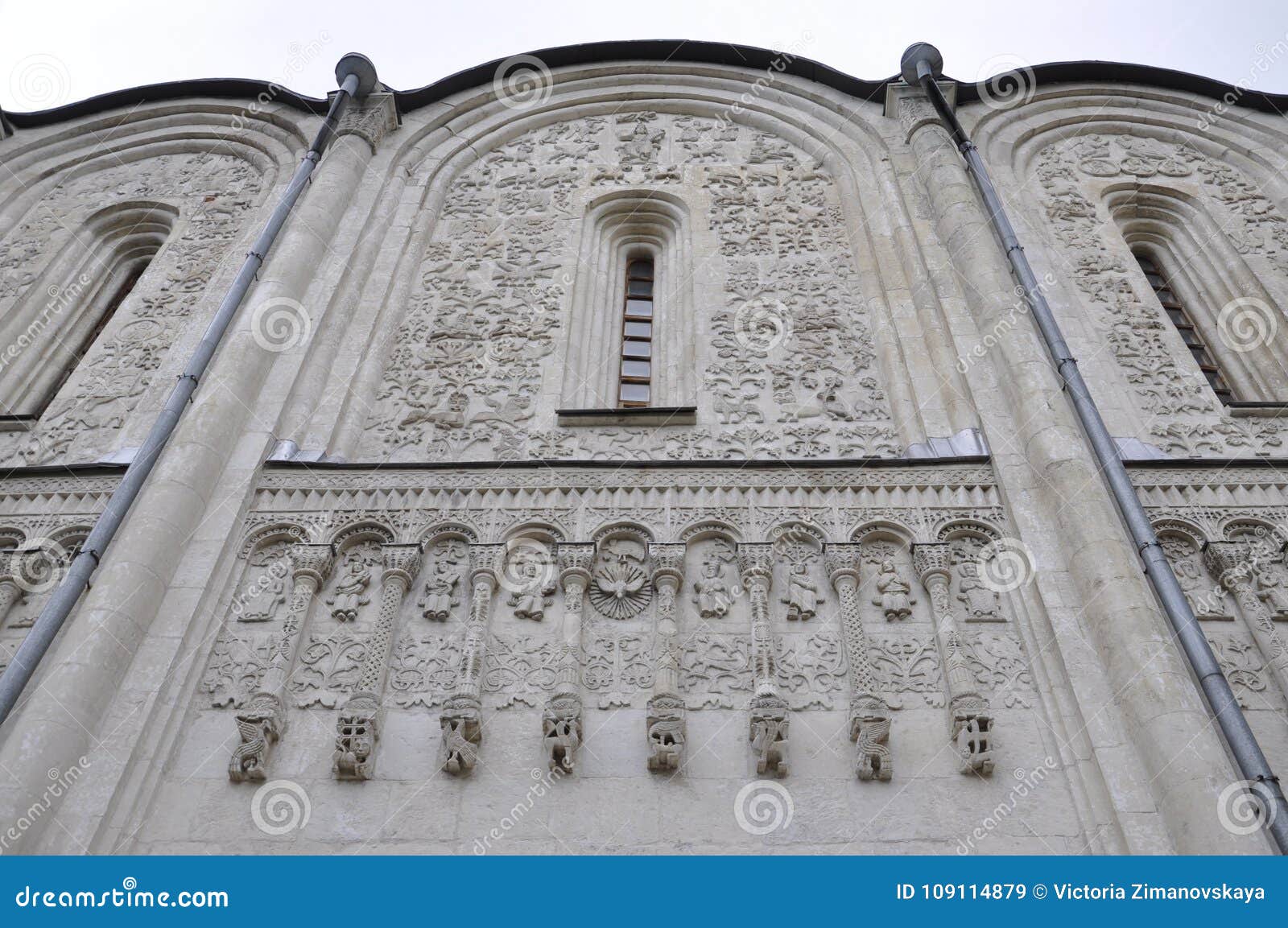 Wall of White Stone with Carved Patterns, Disappearing into the Sky ...
