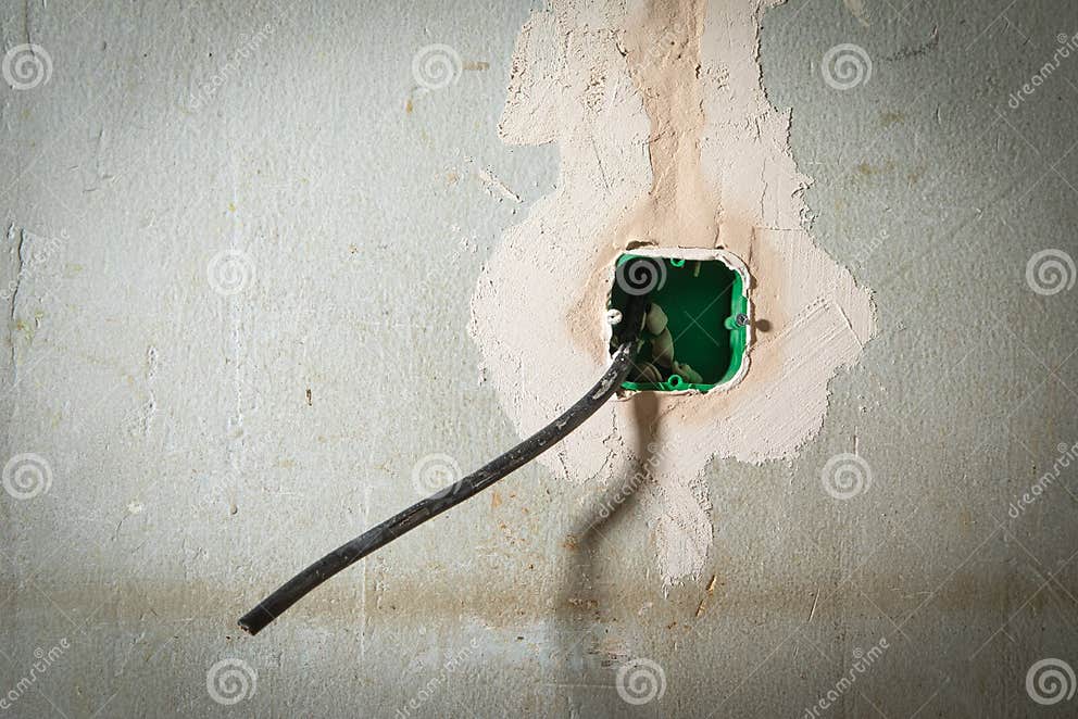 Wall with Wire in Socket Holes. Preparation before Installing Socket ...