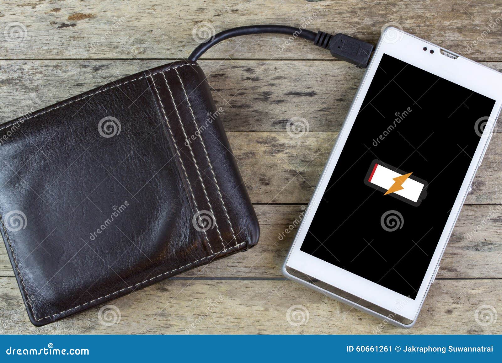 Wallet with energy charge stock image. Image of technology - 60661261