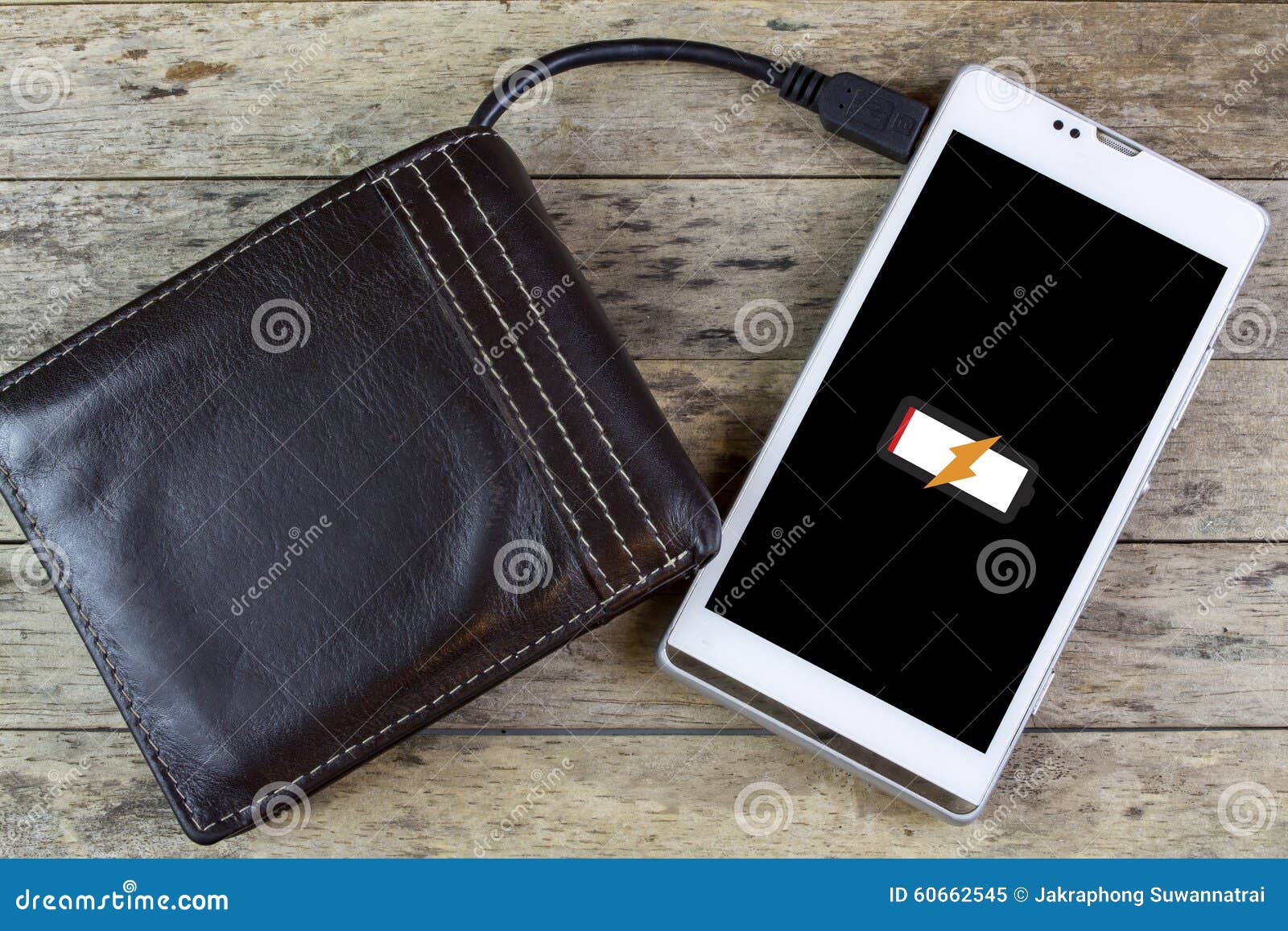 Wallet with energy charge stock image. Image of hand - 60662545
