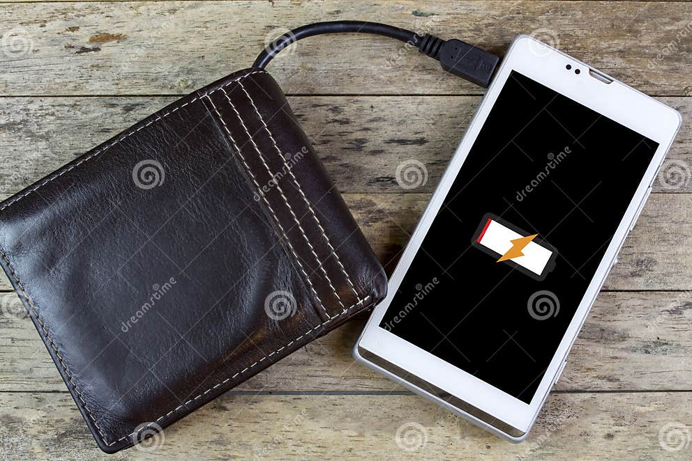 Wallet with energy charge stock image. Image of hand - 60662545