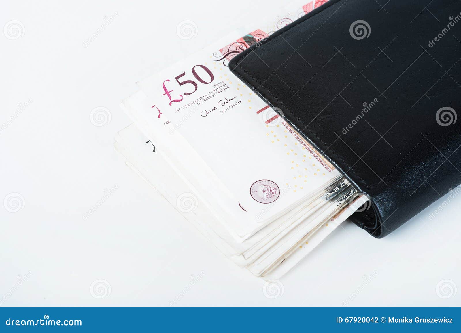 Wallet full of pounds editorial photography. Image of debt - 67920042