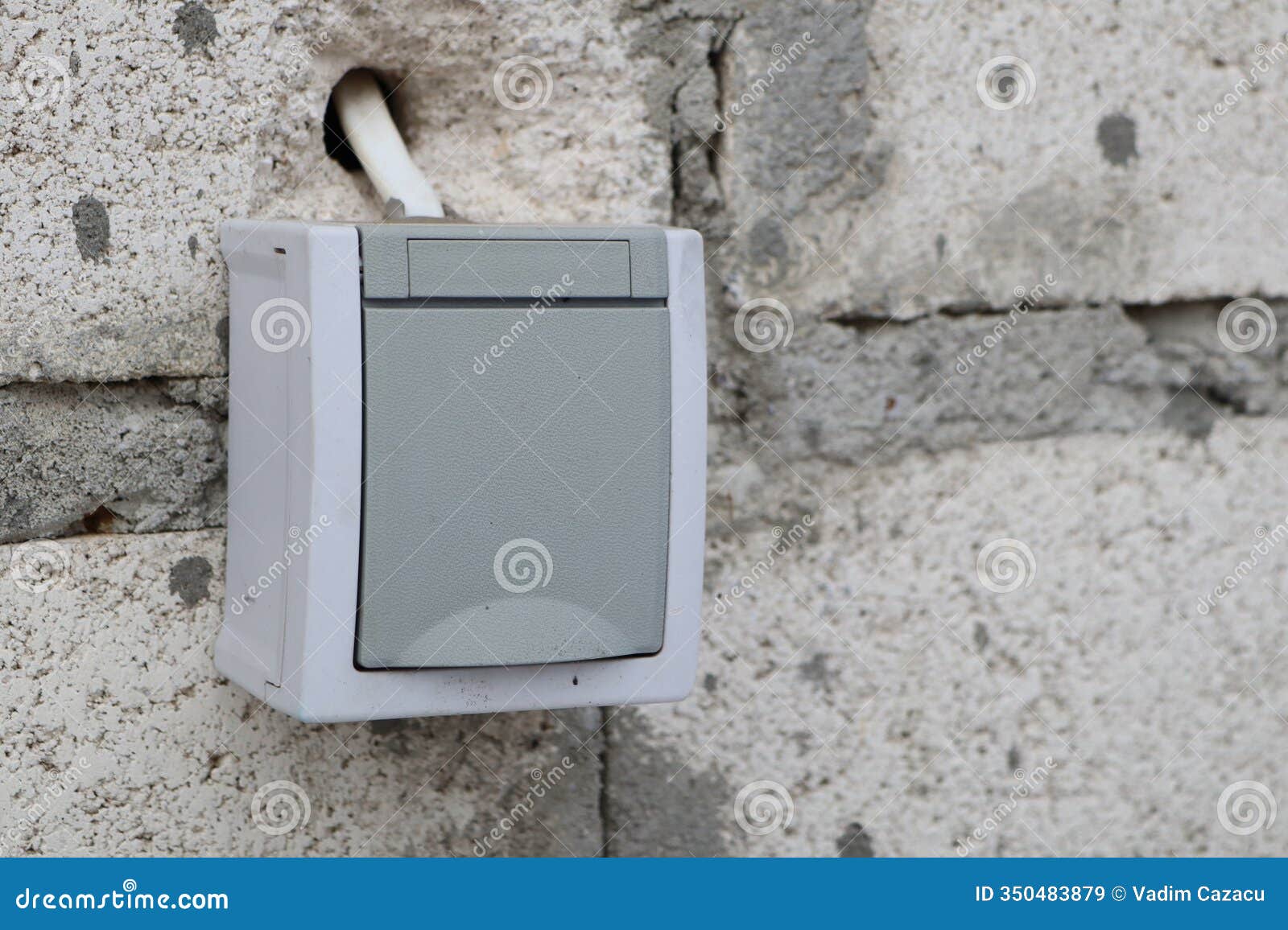 WallMounted Electrical Outlet Installed on Solid Concrete Surface for ...