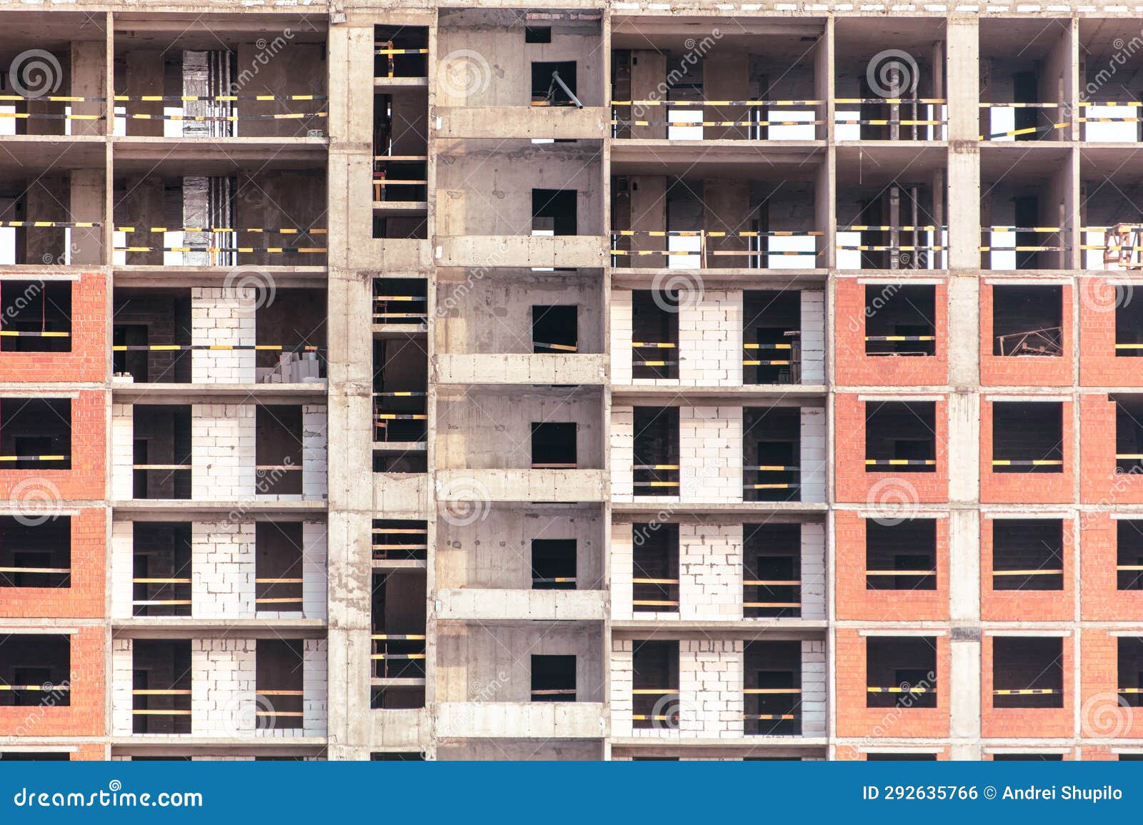 The Walls of a Multi-story Building Under Construction As a Background ...
