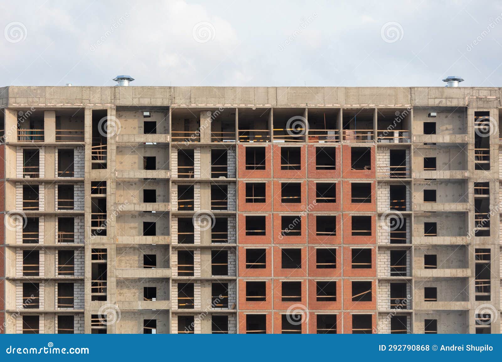 The Walls of a Multi-story Building Under Construction As a Background ...
