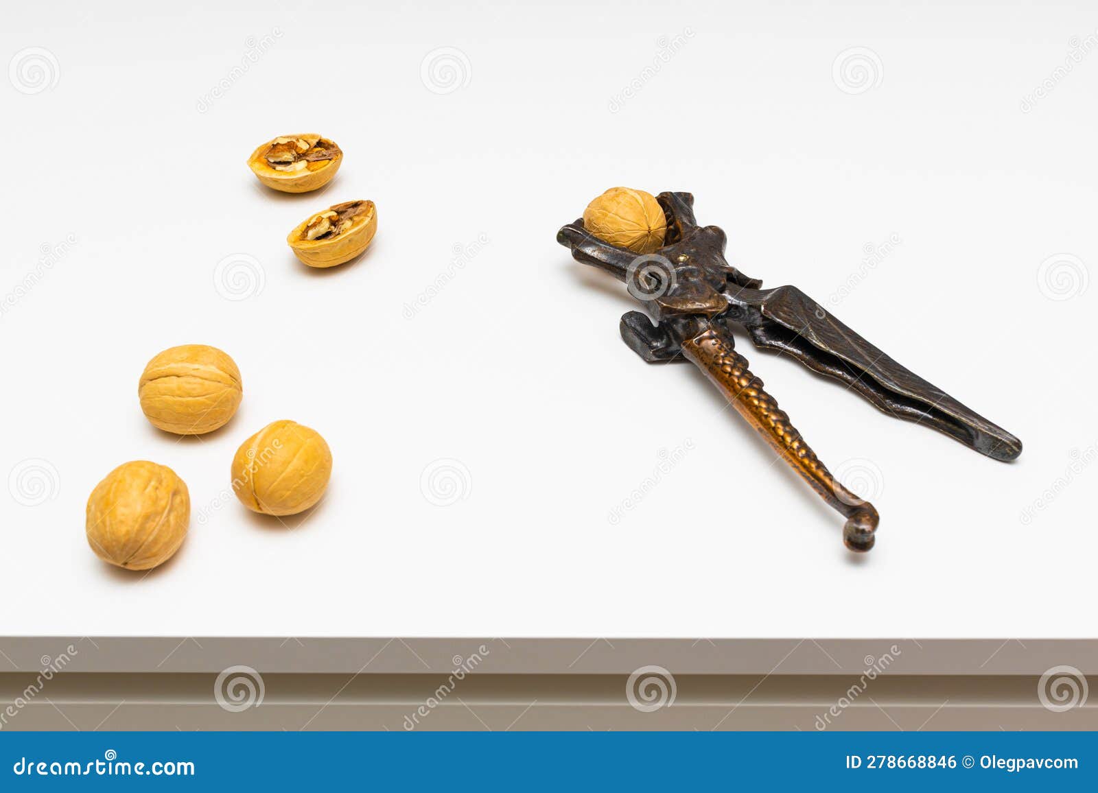Walnut Cracker Photographed Against a White Background. Stock Photo ...