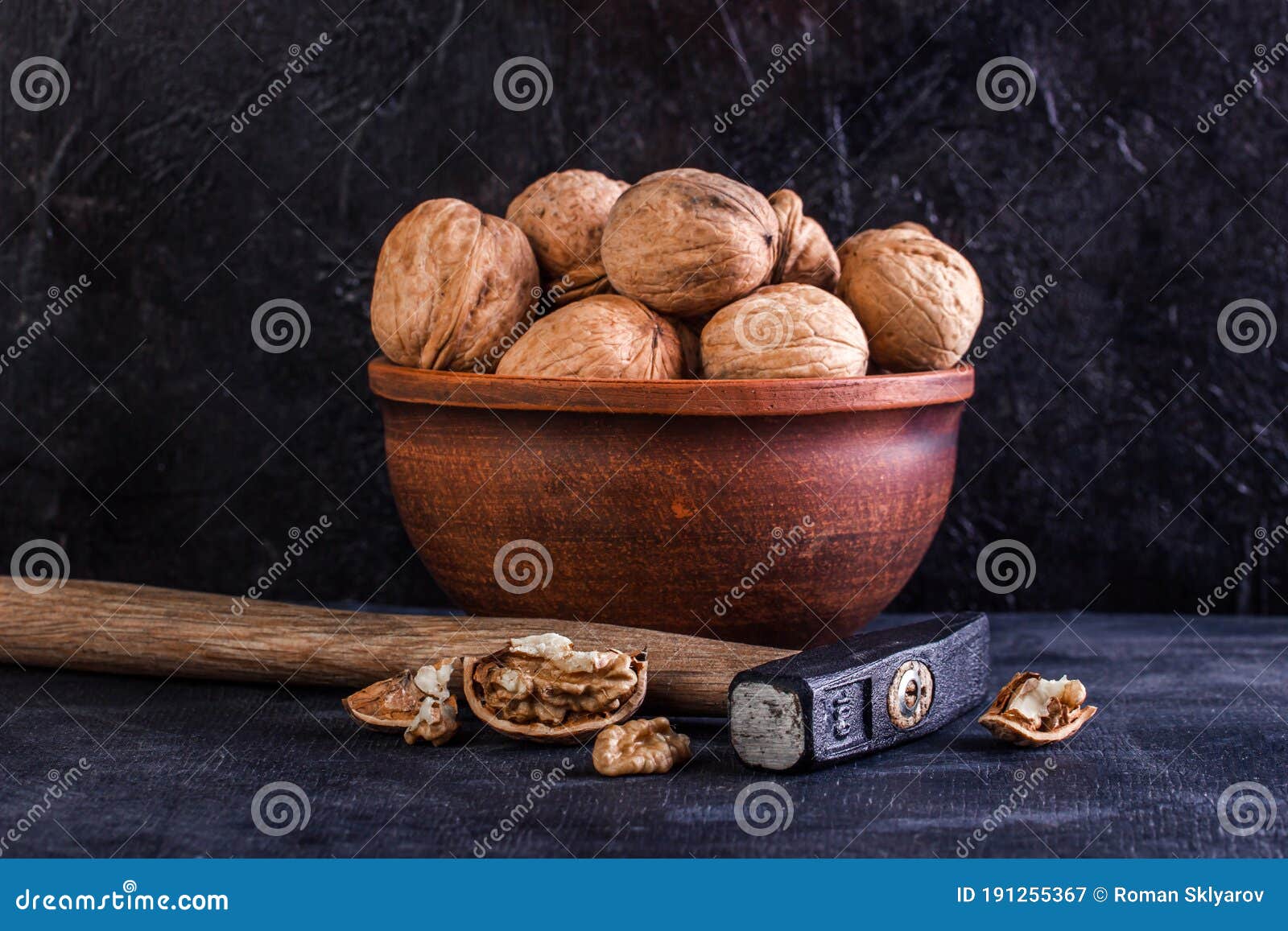 Walnut and Hammer in Clay with Broken Walnut Stock Image - Image of ...