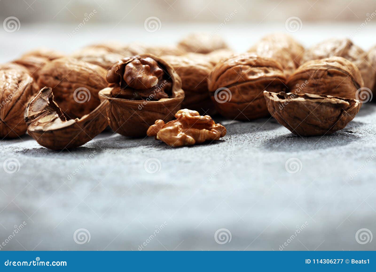 Walnut Kernels and Whole Walnuts on Rustic Old Table Stock Image ...