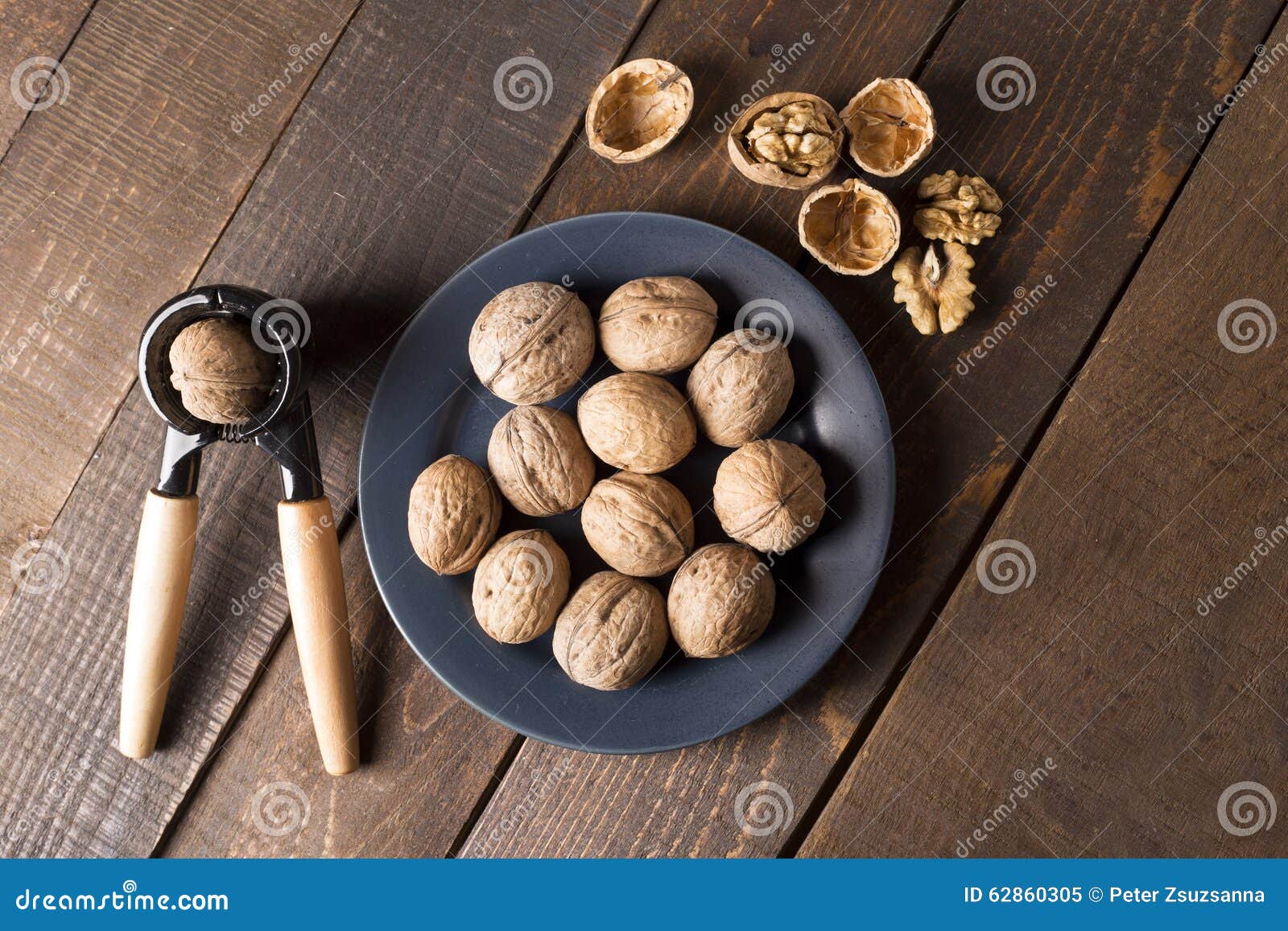 Walnut with nutcracker stock image. Image of ingredient - 62860305