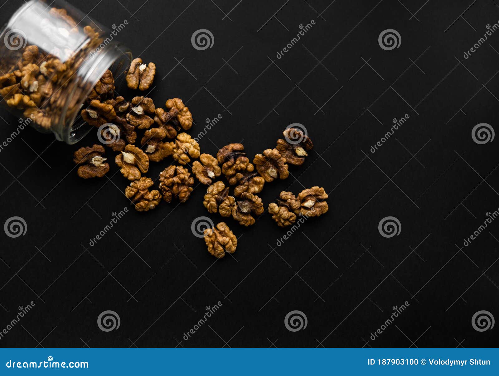 Walnut Scattered on the Black Table from a Jar. Walnut is a Healthy ...