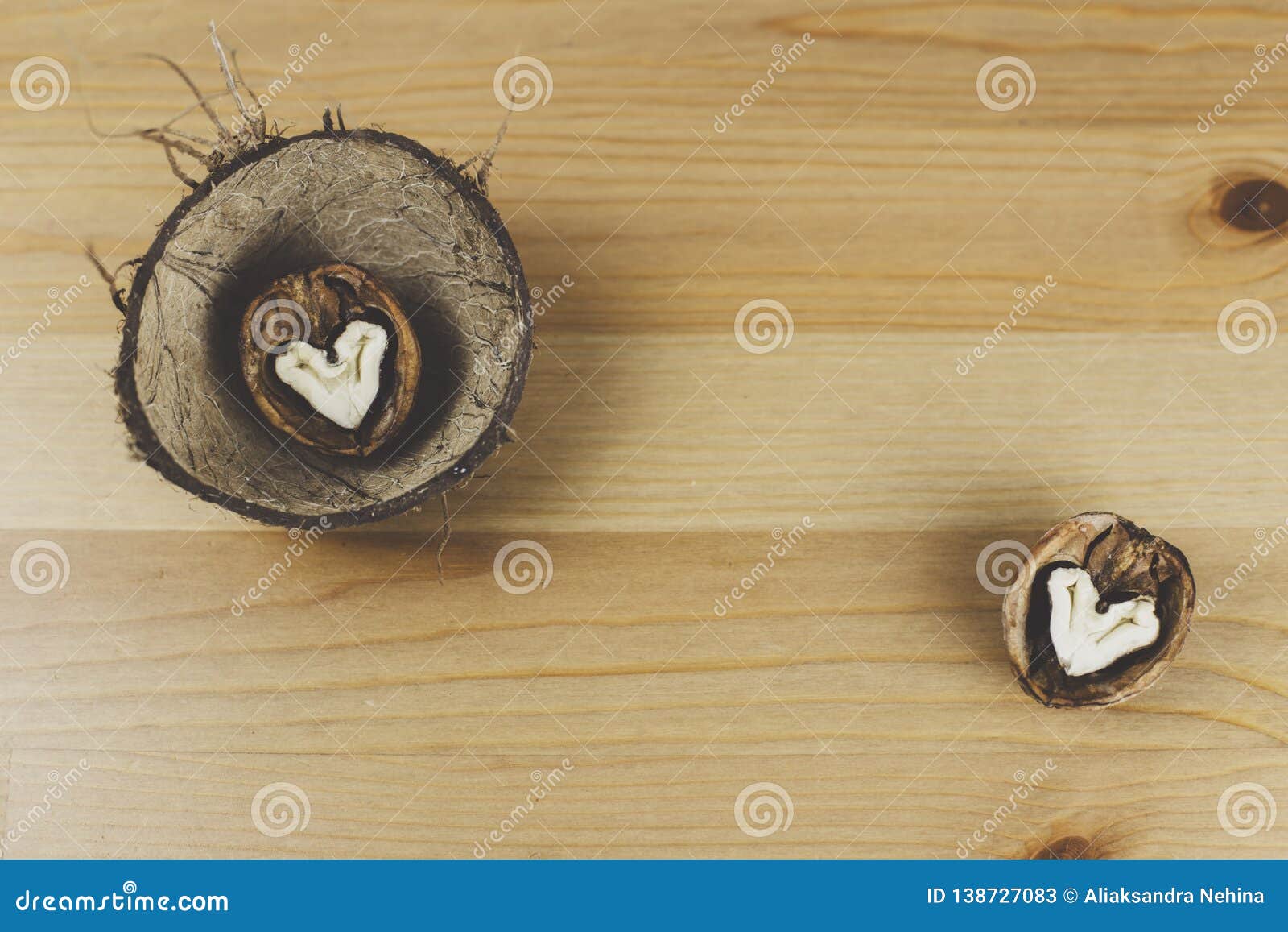 Walnut in the Shape of a Heart Lies in the Shell of a Coconut Stock ...