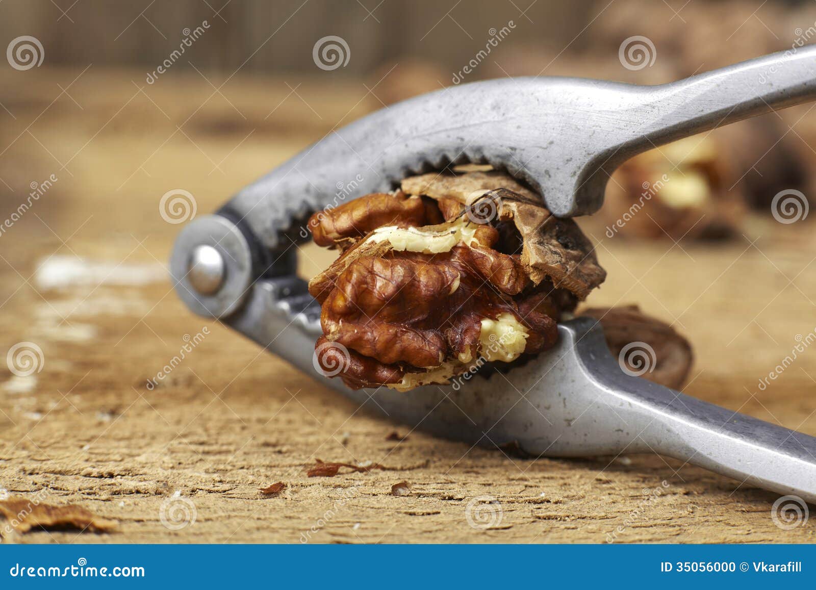 Walnuts Cracked Open with a Nut Cracker Stock Photo - Image of snack ...