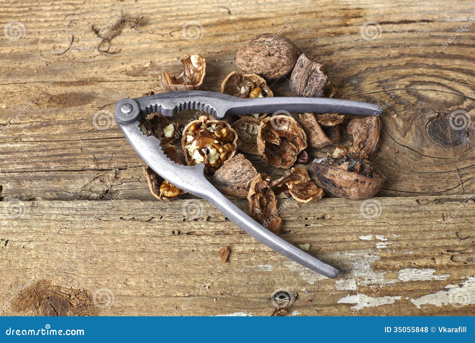 Walnuts Cracked Open with Old Nut Cracker in a Vintage Plate on Stock ...