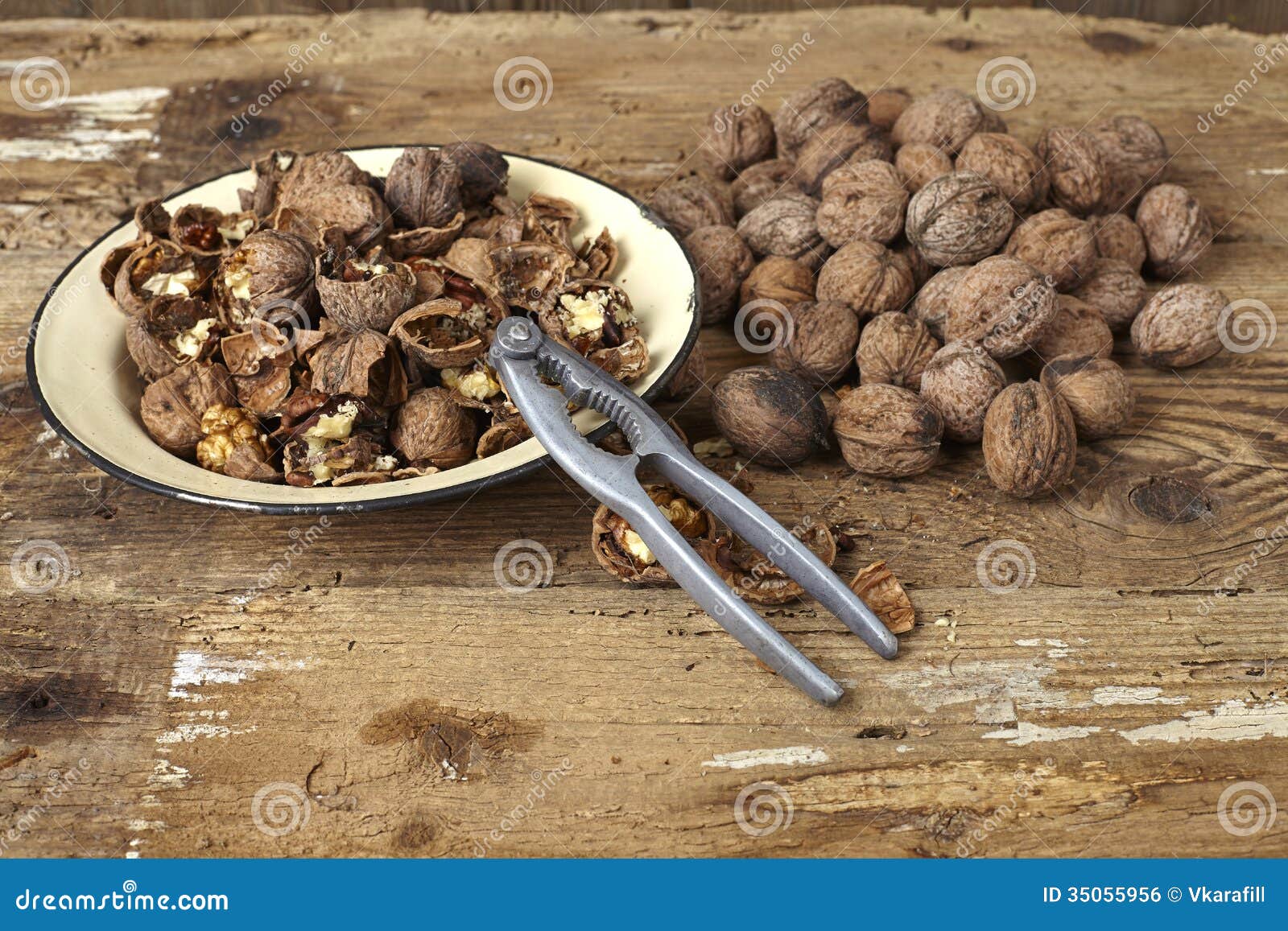 Walnuts Cracked Open with Old Nut Cracker in a Vintage Plate on Stock ...