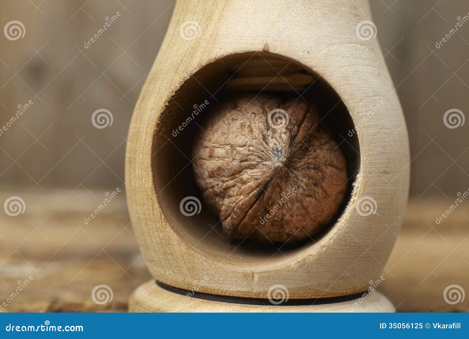 Walnuts Cracked Open with a Wooden Nut Cracker Stock Image - Image of ...