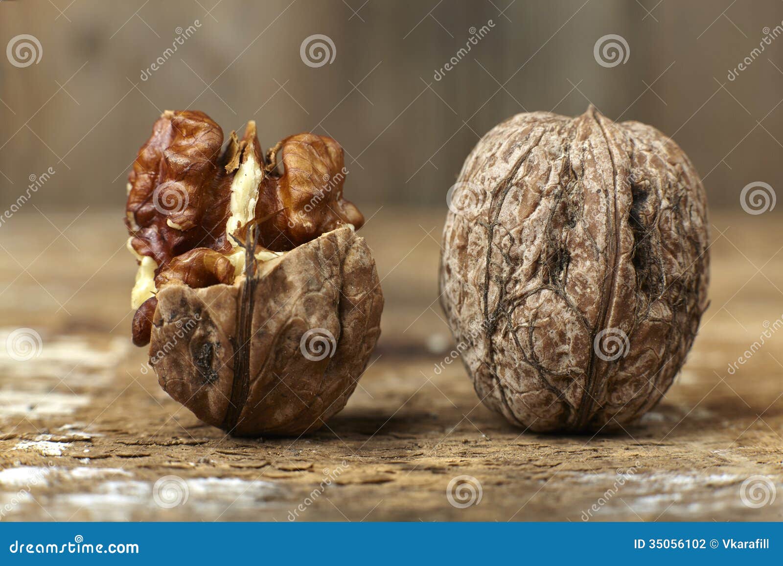 Walnuts Cracked Open on a Wooden Table Stock Photo - Image of healthy ...