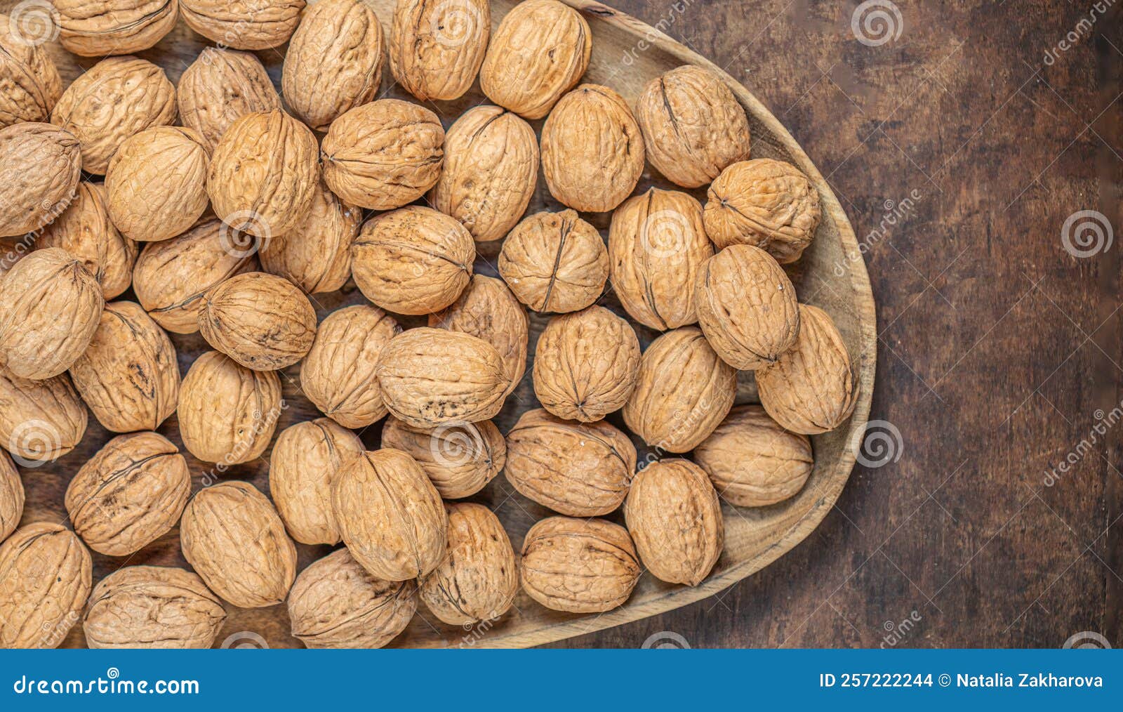 Walnuts on Dark Vintage Table Top View. Fresh Walnuts Kernels in Wooden ...