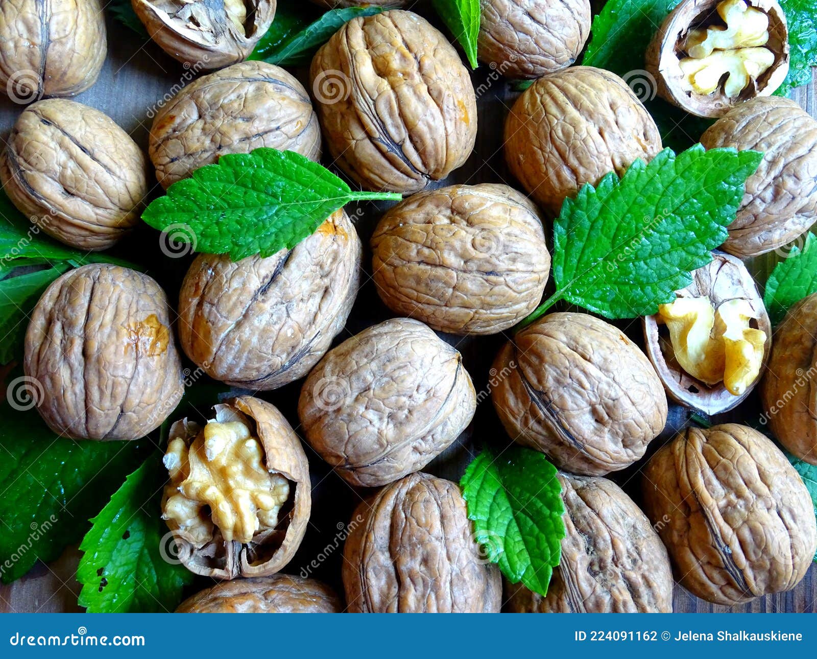 Walnuts and Lemon Balm Leaves Stock Photo - Image of market, background ...