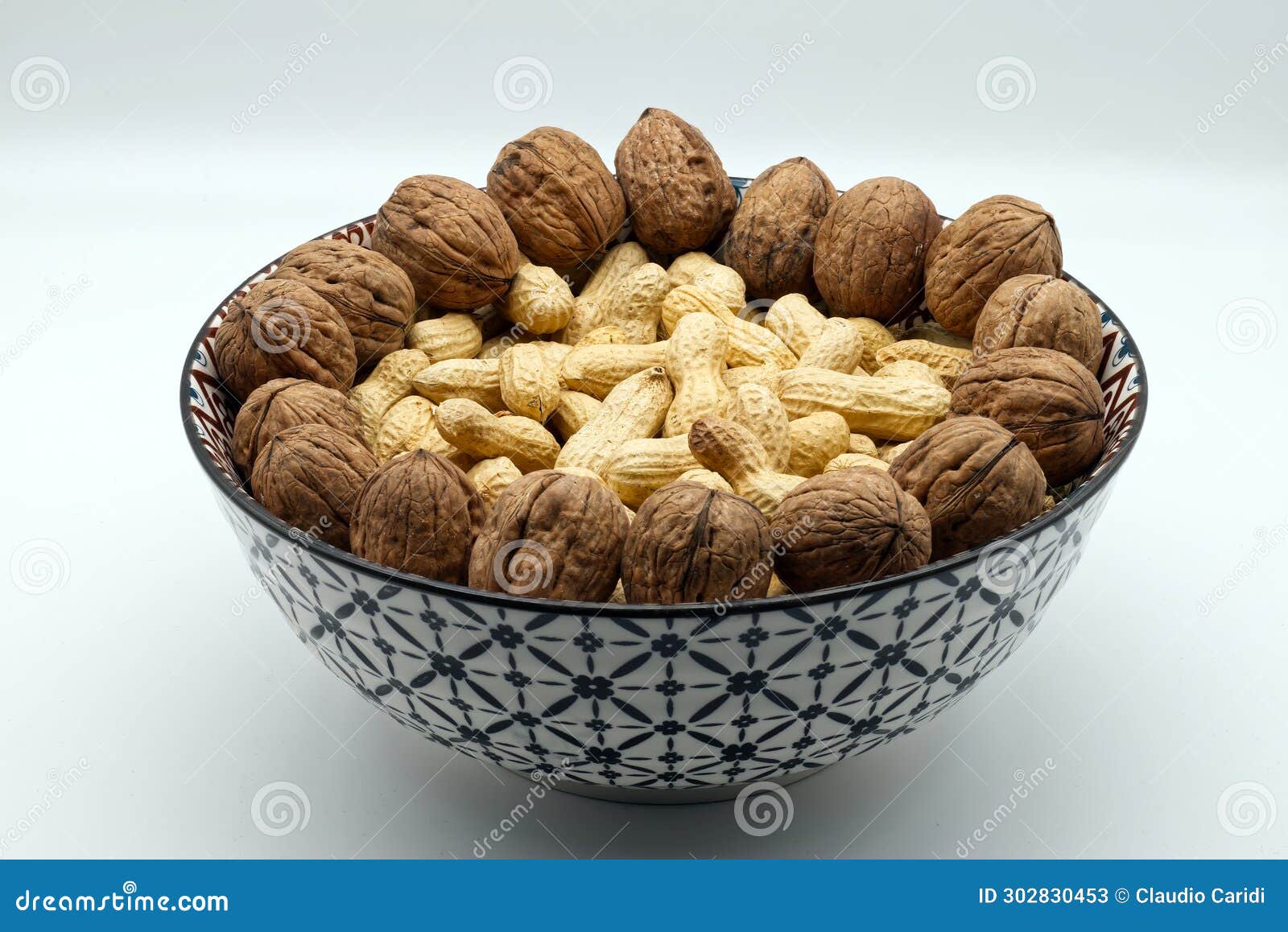 Walnuts and Peanuts in a Bow Isolated on White Backgroud Stock Image ...