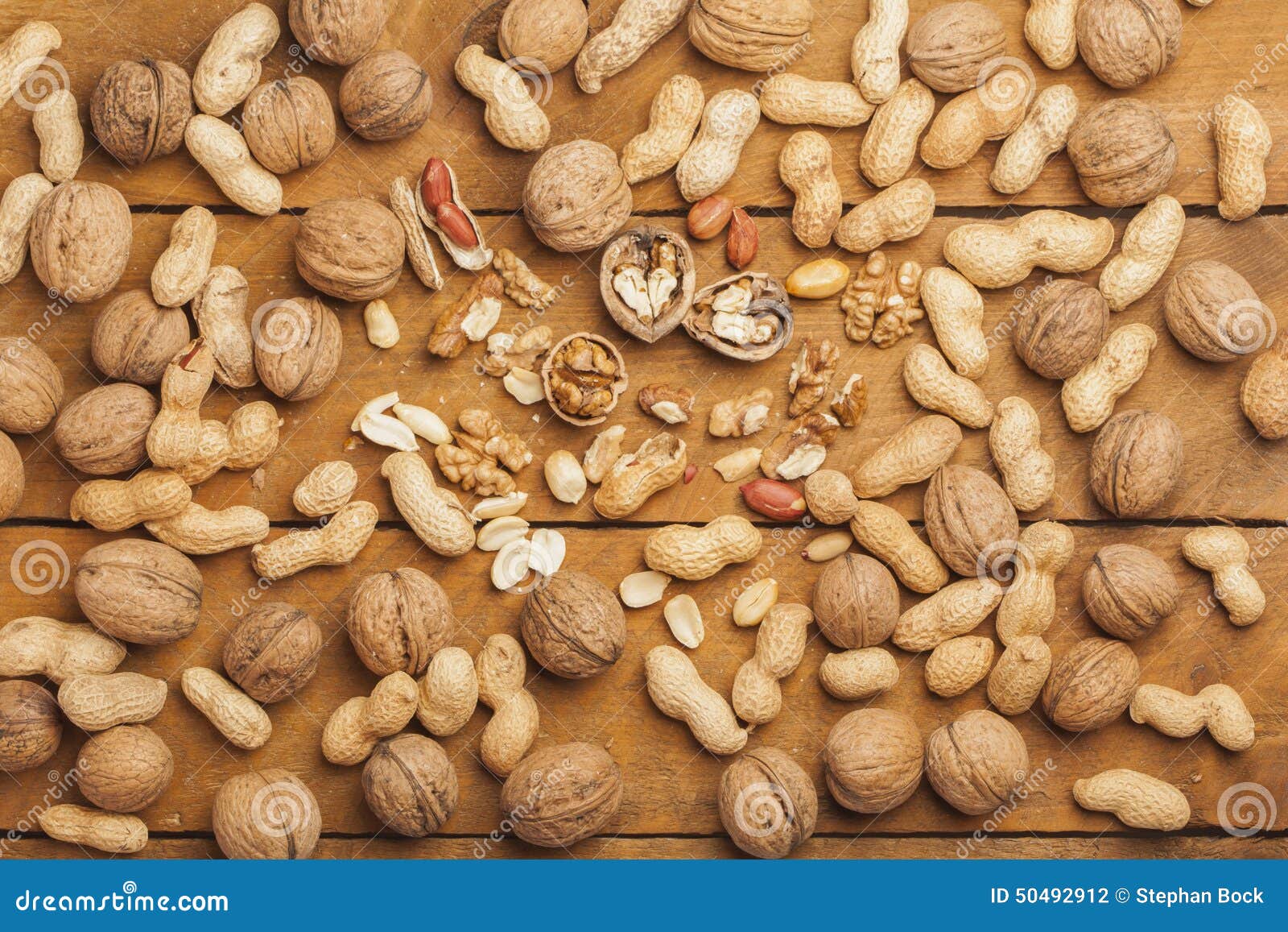 Walnuts and Peanuts on Wood Stock Photo - Image of food, drink: 50492912