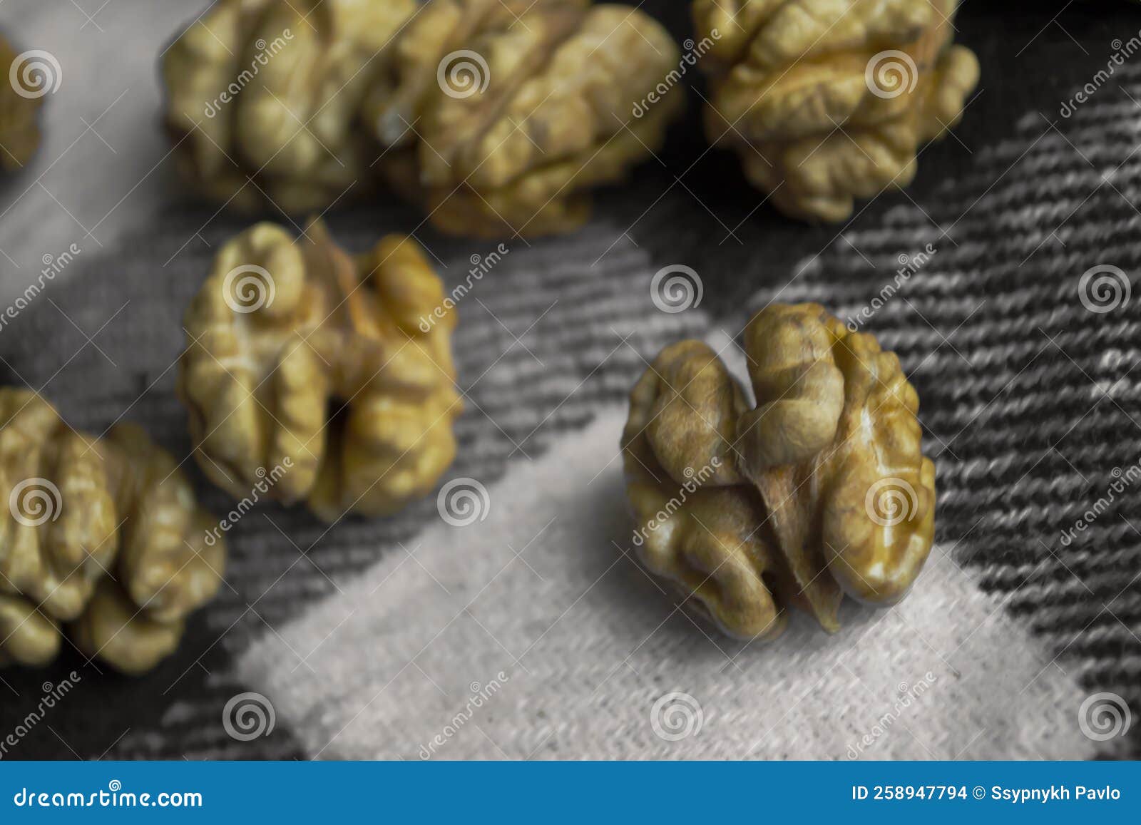 Walnuts Peeled Against the Background in a Cage. Peeled Whole Nuts ...