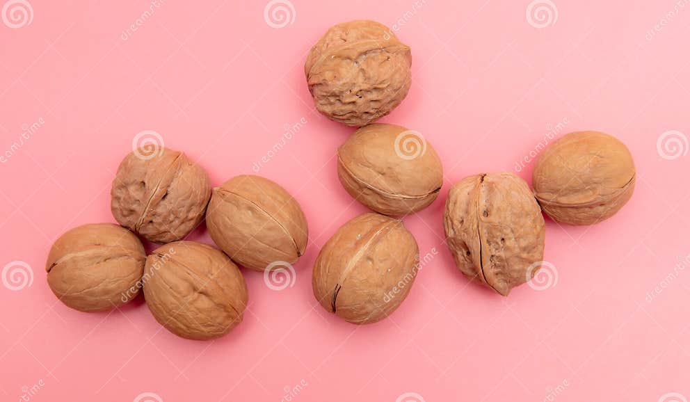 Walnuts on a Pink Background Stock Image - Image of snack, nutrition ...
