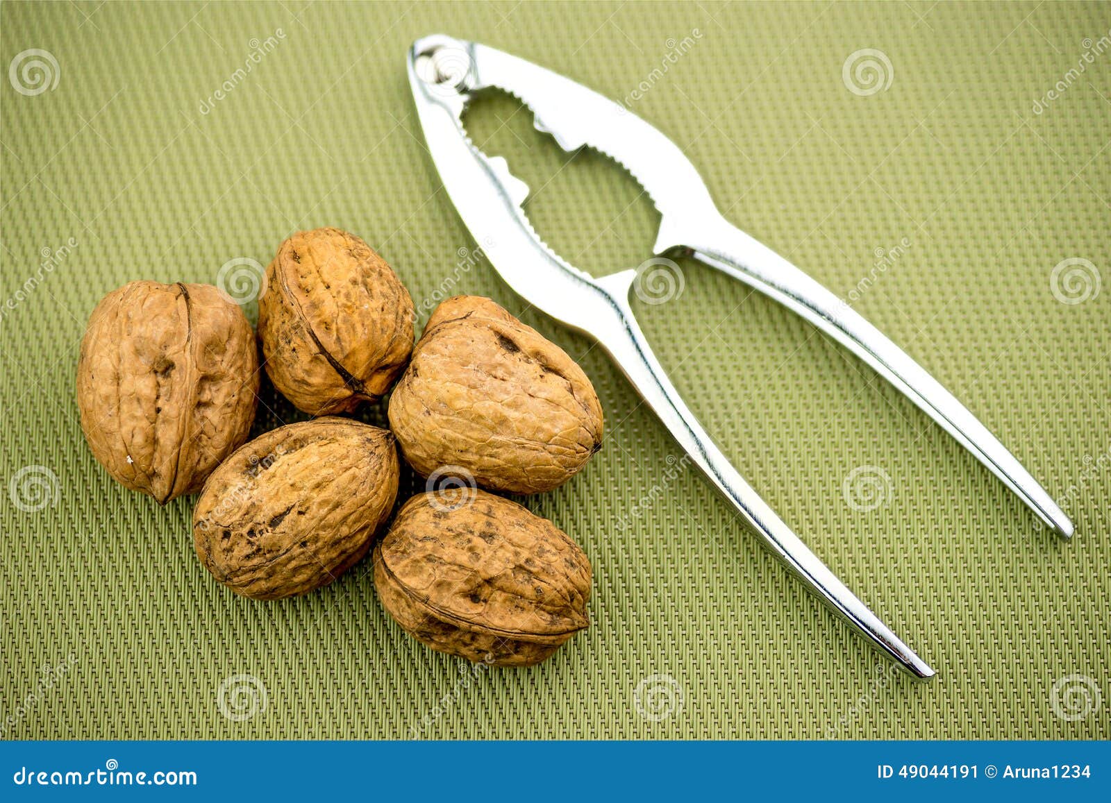 Walnuts in Shells with Nut Cracker Stock Image - Image of cracker ...