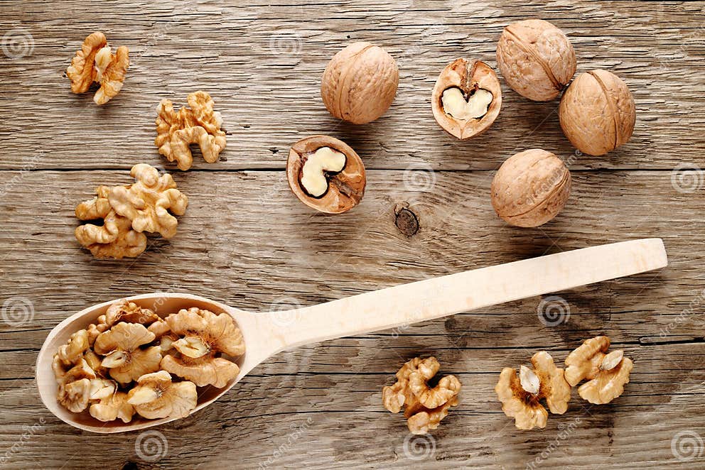 Walnuts in spoon stock image. Image of pile, wooden, brown - 24575545