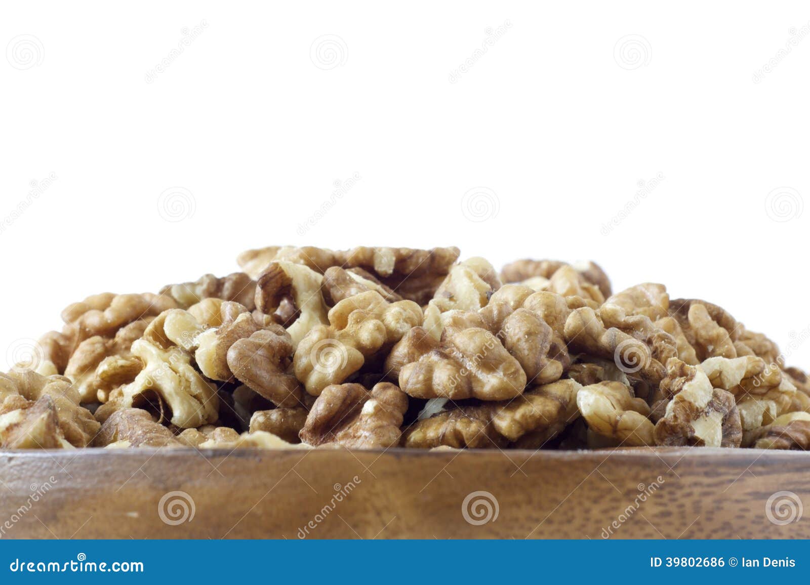 Walnuts in the wooden bowl stock photo. Image of walnut - 39802686