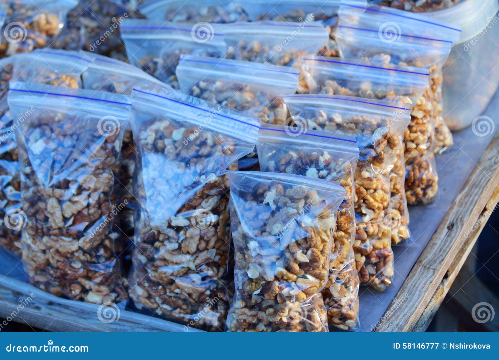 Walnuts wrapped in packets stock image. Image of outdoors - 58146777