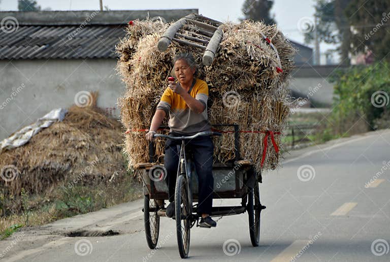 Wan Jia, China: Woman Driving Cart Editorial Stock Image - Image of ... Wan Jia, China: Woman Driving Cart Editorial Stock Image - Image of ...